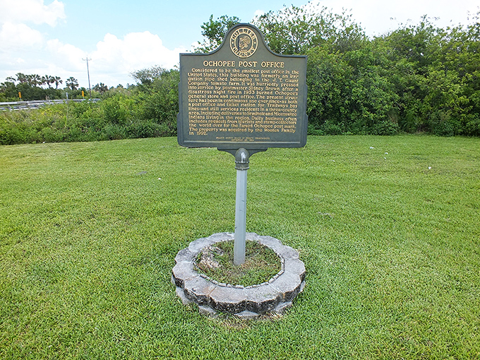 History stands preserved on this marker, telling the tale of how an irrigation pipe shed became a beloved postal institution.