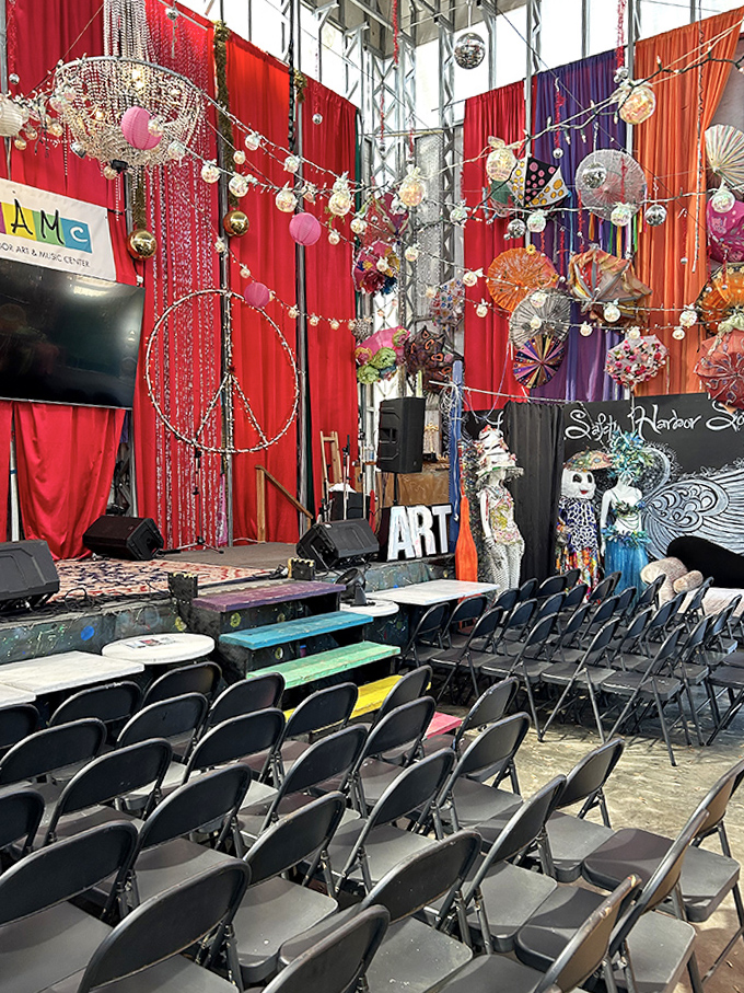 The performance space at SHAMc proves that the best stages don't just host art – they become it, draped in color and possibility.