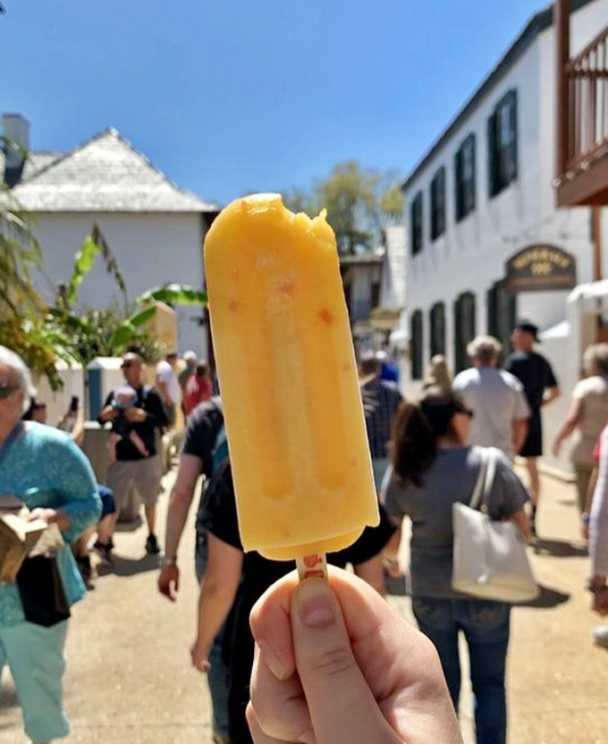 This sunny yellow mango pop brightens St. Augustine's historic district, proving that sometimes the best sightseeing companion comes on a wooden stick.