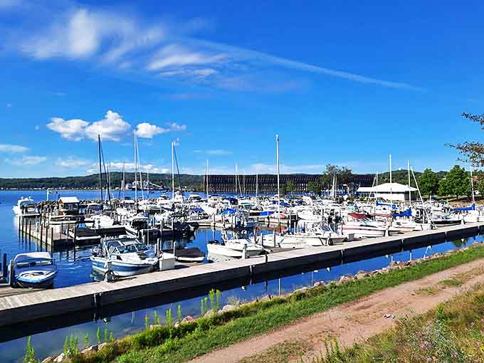 Boats bob peacefully in Marquette's marina, a colorful flotilla against the backdrop of Lake Superior's endless blue horizon.