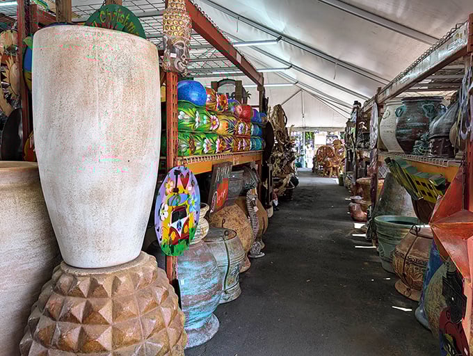 Inside the covered areas, treasures line both sides of the aisle &ndash; a wonderland of pottery and smaller garden accents.