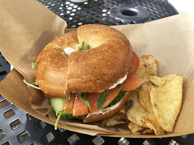 Nova Lox perfection – buttery salmon, crisp vegetables, and cream cheese on a fresh bagel, proving simplicity can be sublime.