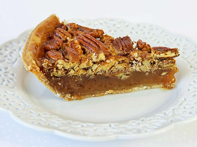 Pecan pie: Southern comfort reimagined. Those pecans aren't just topping the pie&mdash;they're having their own little flavor party and we're all invited.