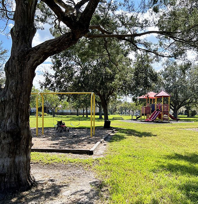 Red Barber Park's playground equipment stands ready for little adventurers to conquer, climb, and create their own afternoon stories.