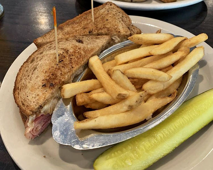 The Reubensteiner sandwich – where corned beef meets sauerkraut in a marriage so perfect it deserves its own reality show.