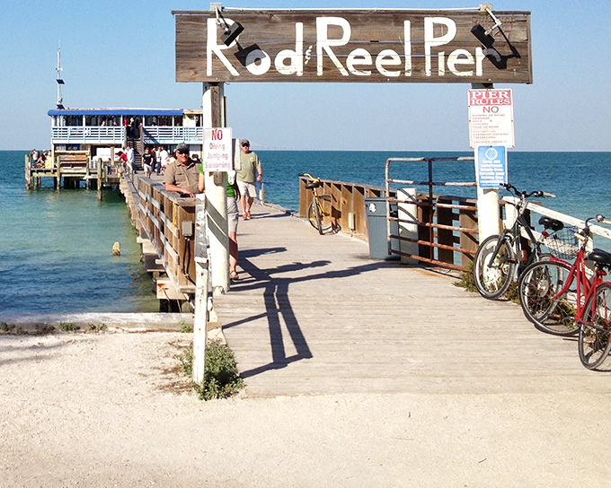 The Rod and Reel Pier entrance promises simple pleasures: good food, great fishing, and the kind of views money usually can't buy.