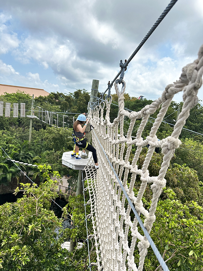 "Just one more step" becomes your mantra. This swaying rope bridge transforms ordinary tourists into intrepid explorers within seconds.
