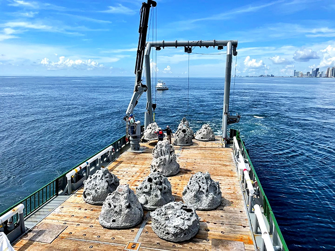 Fresh sculptures await their journey to the depths, each designed to create habitat while honoring the ocean's mythical guardians.