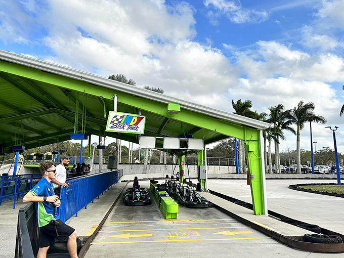 Staff prepare the go-karts for another round of racing, ensuring safety while maintaining the park's reputation for speed.