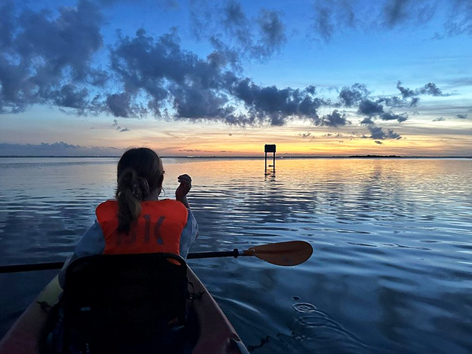 The golden hour transition &ndash; when regular paddling becomes magical as day surrenders to night and the waters prepare to glow.