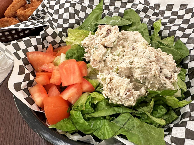 Fresh tarragon chicken salad with juicy tomatoes offers a savory respite from sugar overload. Balance is everything!