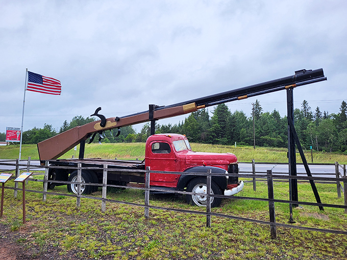 This vintage truck supports what might be the world's largest rifle, combining America's love of oversized roadside attractions with its equally outsized appreciation for firearms.