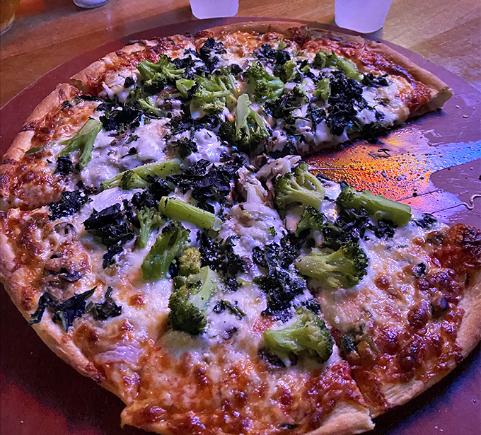 Not just an afterthought for non-meat eaters, this garden-fresh pizza celebrates broccoli and other vegetables with cheese-pulling perfection.