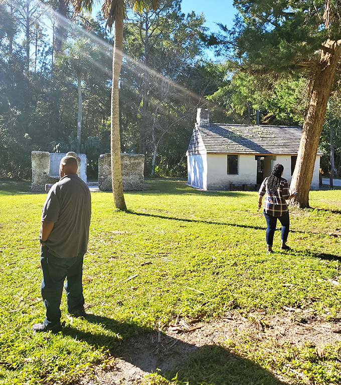 Visitors contemplate the weight of history as they explore the grounds, each building offering a different perspective on plantation life.