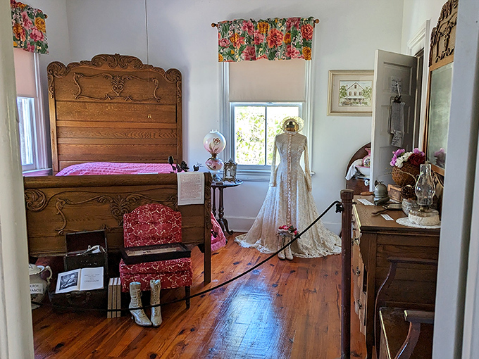 That colorful quilt adds a surprising pop of modernity to this otherwise period-perfect bedroom, where the high mattress practically requires mountaineering equipment to climb aboard.