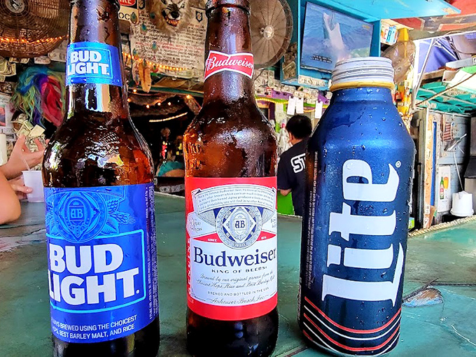 Cold beer doesn't need fancy packaging when you're drinking it surrounded by what might be Florida's largest collection of random nautical debris.