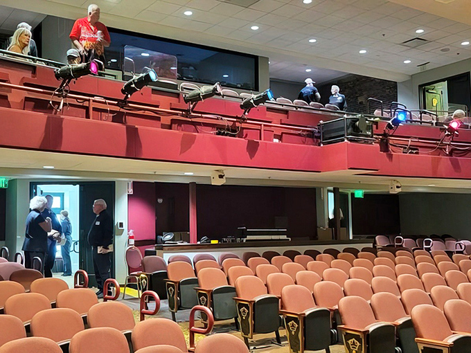 Patrons gather in anticipation before a show, some perhaps wondering if they'll experience more than just the scheduled performance.