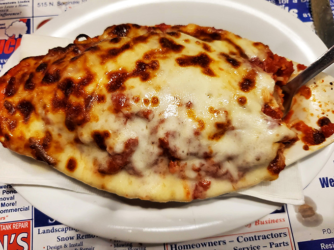 The restaurant's lasagna arrives still sizzling, with cheese that stretches dramatically with each bite &ndash; dinner and a show!