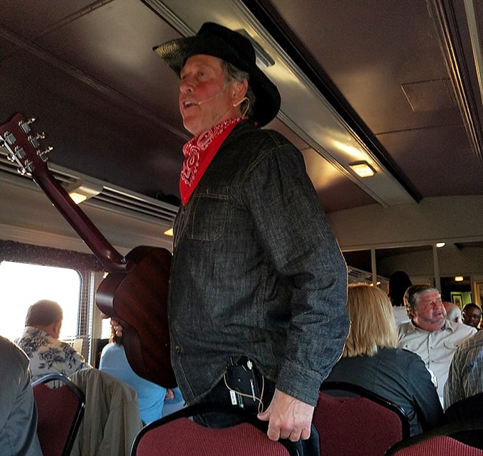 Live music weaves through the train cars, this guitar-wielding entertainer adding soundtrack to suspense as the mystery deepens between courses.