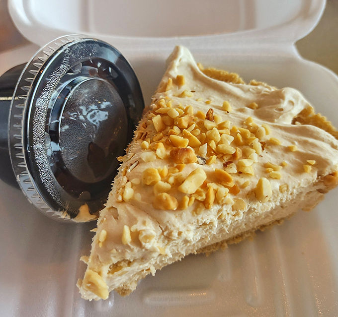 Peanut butter pie that transforms childhood sandwich nostalgia into sophisticated dessert glory, crowned with crunchy nuts for textural perfection.