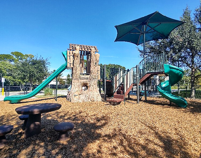 This playground cleverly disguised as a treehouse lets kids burn energy while parents pretend they're not envious of the slides.