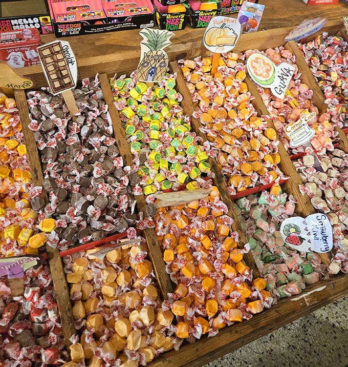 The salt water taffy display is a kaleidoscope of wrapped possibilities &ndash; each twisted paper end concealing a chewy morsel of happiness in flavors both familiar and adventurous.