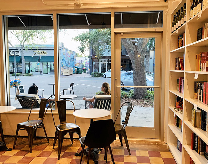 Literary worlds unfold in this thoughtfully designed reading nook, where comfortable chairs practically whisper, "Stay awhile, turn another page."