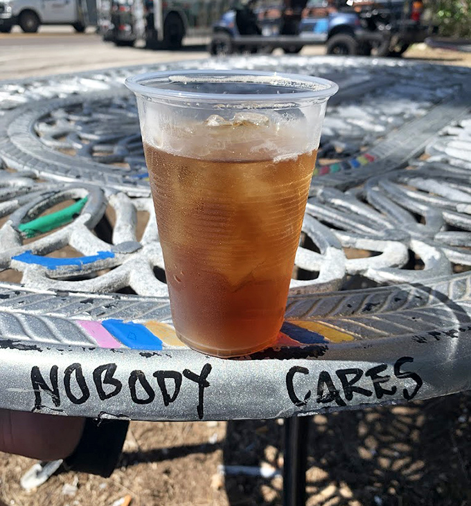 Even the tables tell stories at The Mahuffer, with messages and artwork accumulated over years of patrons leaving their mark.