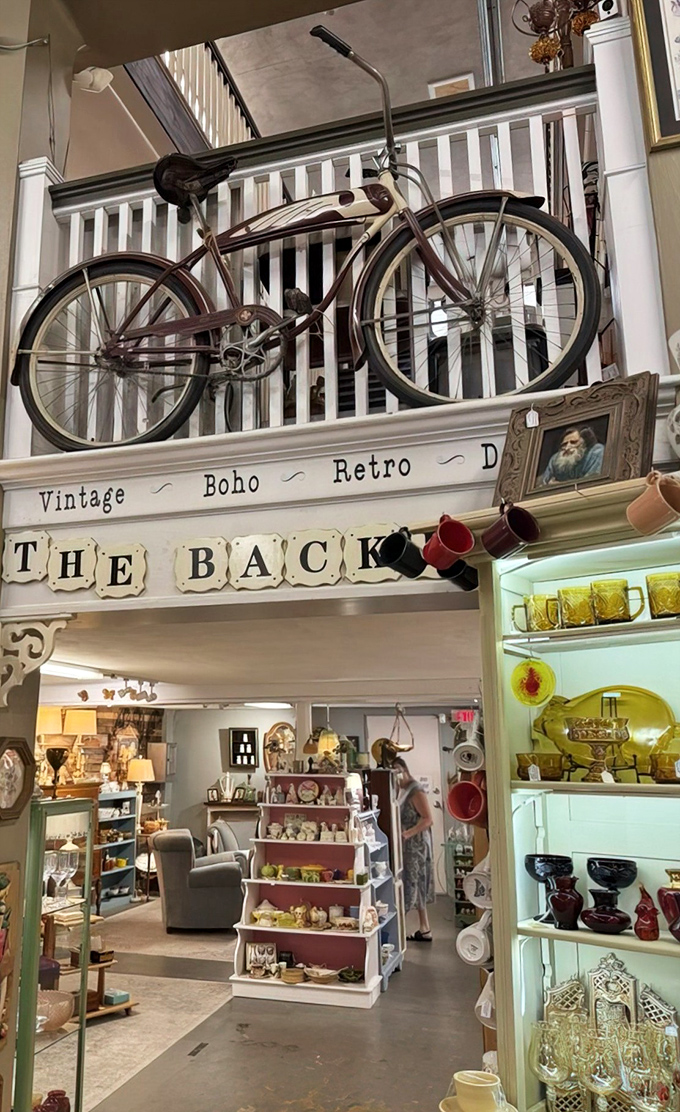 "The Back" &ndash; where bohemian dreams come true with a vintage bicycle standing guard over eclectic treasures below.