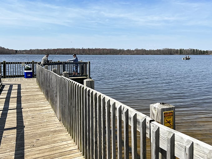 Anglers line the wooden pier like patient philosophers, knowing that fishing isn't just about catching &ndash; it's about the magnificent waiting.