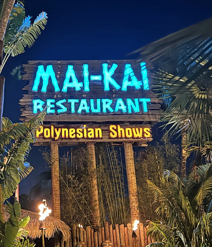 Mai-Kai's illuminated sign glows against the night sky, promising an evening of Polynesian entertainment and tropical cocktails.