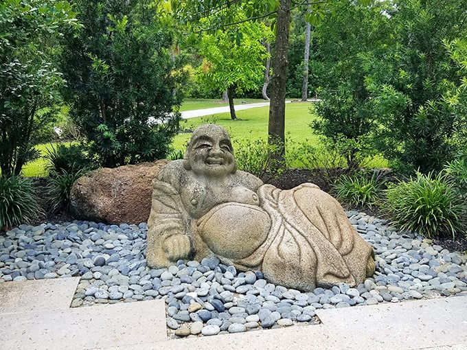 Easter Island meets Japan as these stoic stone faces stand guard among the peaceful landscape of Morikami's meticulously designed gardens.
