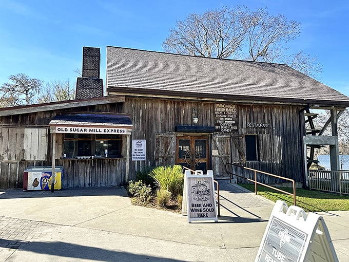 The Old Sugar Mill's historic brick chimney and weathered wooden exterior tell stories of Florida's past while pancake perfume fills the air.
