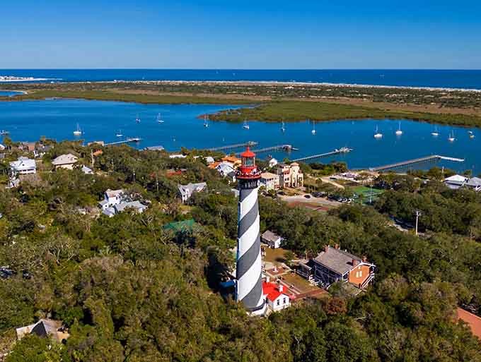 St. Augustine Lighthouse stands proud with its distinctive stripes, guiding ships and impressing visitors since the 1870s.