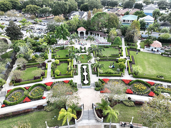 A bird's-eye view reveals Hollis Garden's meticulous design, where fountains anchor geometric flowerbeds in this downtown Lakeland gem.