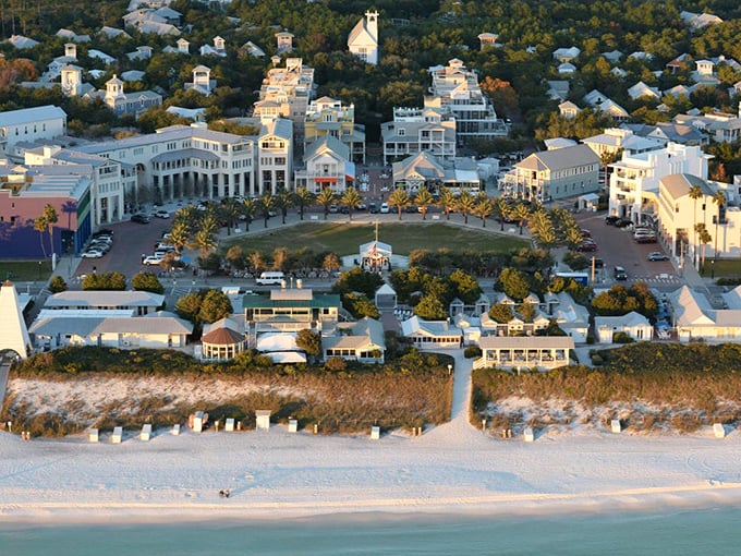 The town center buzzes with activity as visitors and locals gather around the iconic pavilion and green spaces.