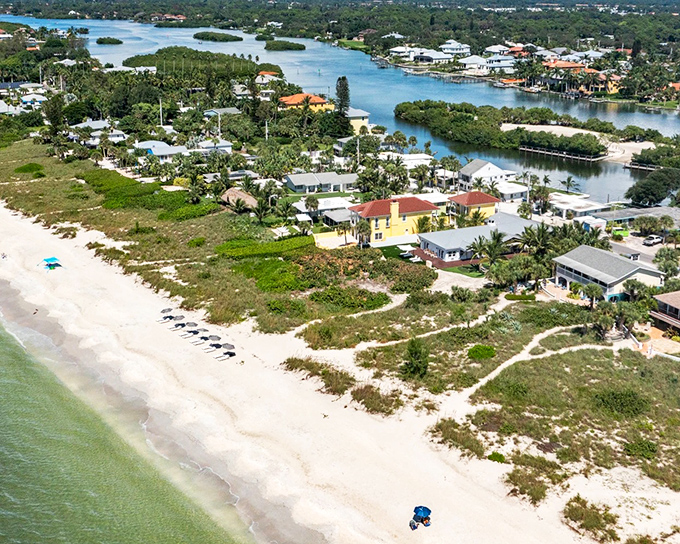 This aerial view reveals Casey Key's unique geography &ndash; a slender island where residents enjoy both Gulf beaches and protected bay waters.