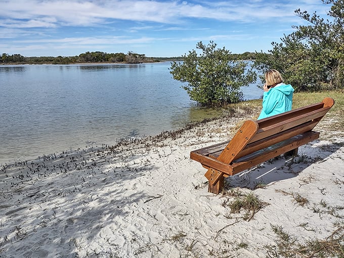 A moment of quiet reflection by the water's edge, where the Matanzas River whispers stories of old Florida to those who listen.