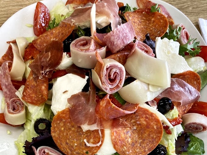 A mountain of Italian meats, cheeses, and veggies that makes other salads look like they're not even trying.