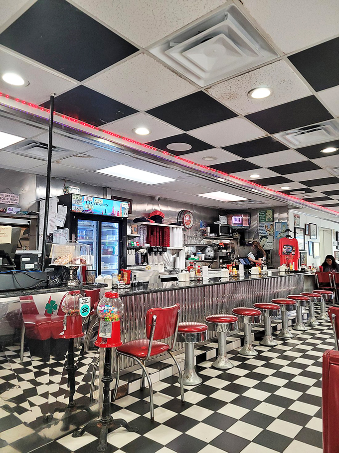 The counter seating offers front-row views to short-order magic, where cooks transform simple ingredients into diner classics with practiced precision.