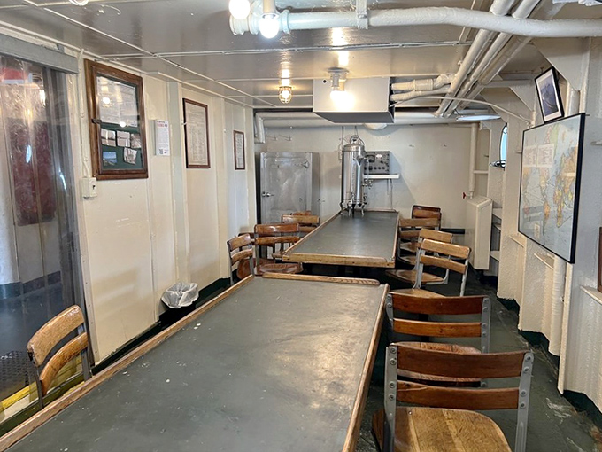 The Crew Mess Hall, where hundreds of hungry sailors once gathered, now sits in preserved silence.