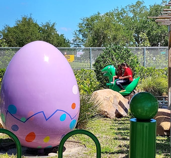 A giant purple dinosaur egg stands guard in the prehistoric play area – channeling George's dinosaur obsession into an Instagram-worthy photo opportunity.