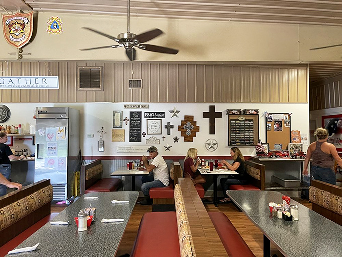 The dining room hums with conversation as ceiling fans lazily spin overhead, creating the perfect backdrop for unhurried meals and catching up.