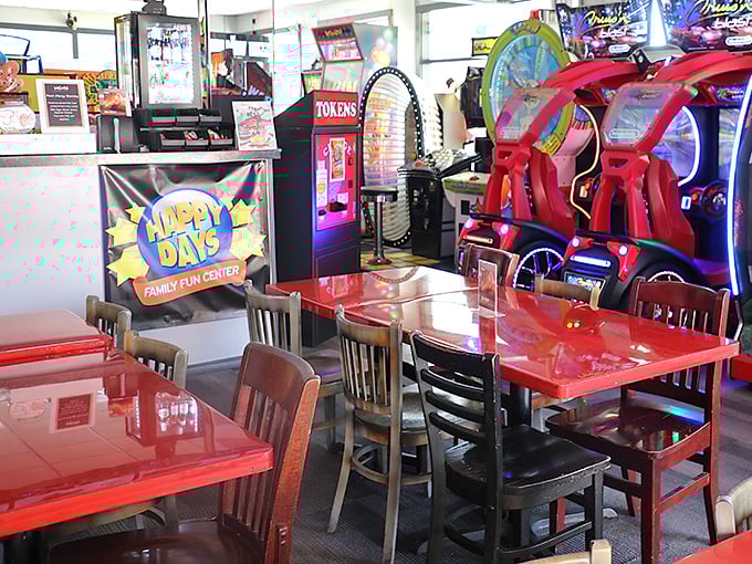 Dining Area: These cherry-red tables have witnessed countless strategic gaming discussions, celebratory high-fives, and the occasional "I told you we should've saved those tickets!"