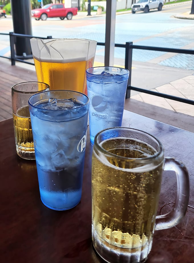 Frosty mugs of golden beer and ice-cold sodas – the perfect companions for taming the sweet heat of barbecue sauce and washing down smoky goodness.