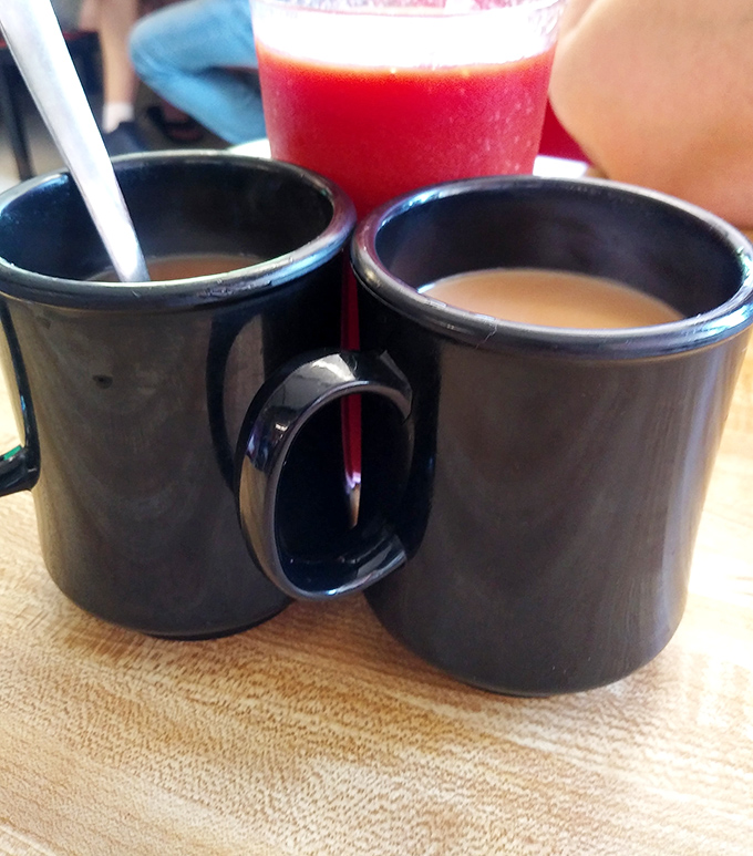 Black coffee in sturdy mugs &ndash; because sometimes the simple pleasures are the most satisfying.