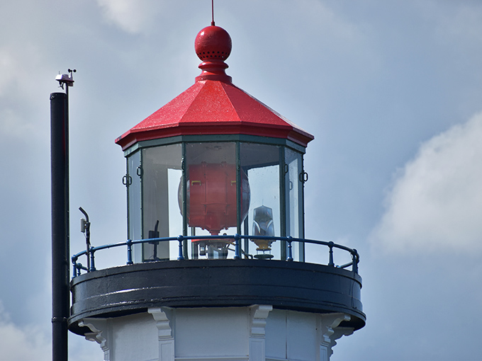 Mother Nature frames the lighthouse perfectly, as if she's been taking composition classes just for this Instagram-worthy moment.