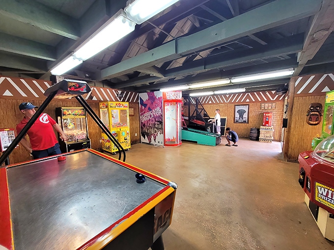 Between rounds, the arcade offers air-conditioned respite and classic gaming thrills, maintaining the adventure theme right down to the bamboo-styled decor.