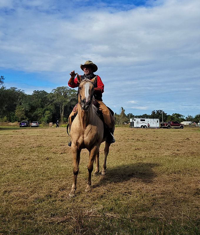 A rider guides his horse across open fields, embodying the spirit of the American West that still gallops through our collective imagination.