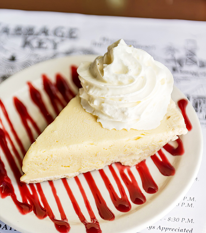 The Key lime pie finale &ndash; tangy, sweet, and creamy with that perfect graham cracker crust. Florida's signature dessert done absolutely right.